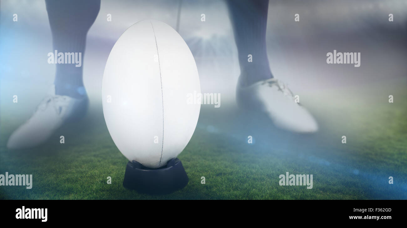 Composite image of rugby player ready to make a drop kick Stock Photo ...