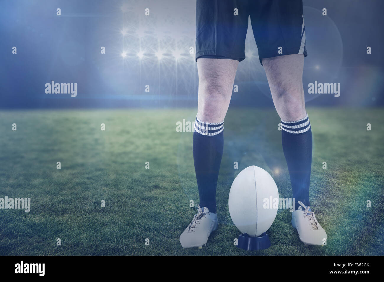 Composite image of rugby player ready to make a drop kick Stock Photo ...