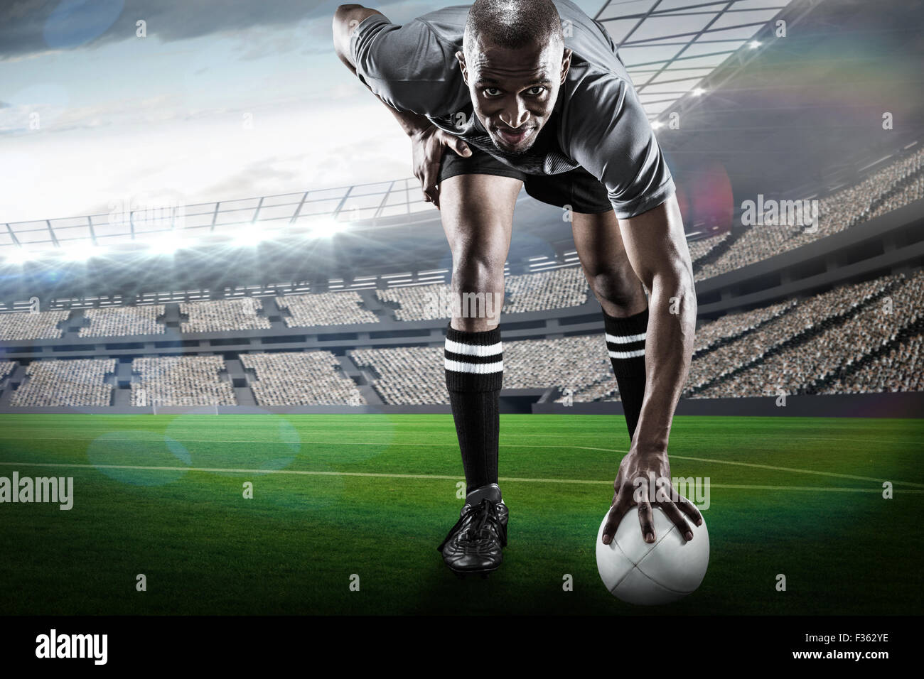 Composite image of portrait of rugby player smiling Stock Photo - Alamy