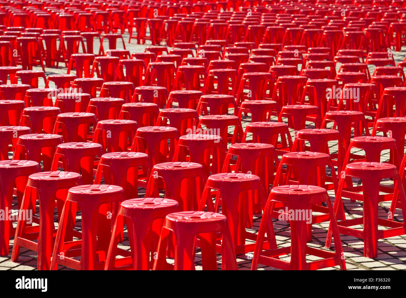 Row of plastic chairs hi-res stock photography and images - Alamy