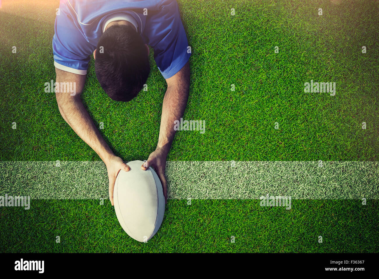 Composite image of a rugby player scoring a try Stock Photo - Alamy