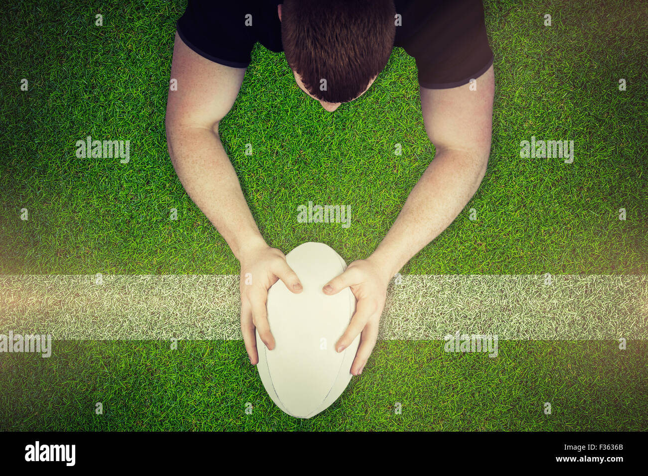 Composite image of a rugby player scoring a try Stock Photo - Alamy