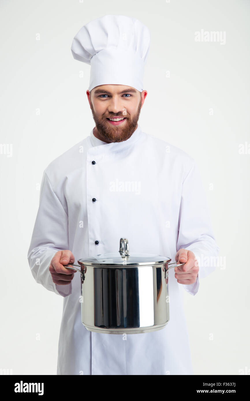 Portrait of a male chef cook holding pan isolated on a white background ...