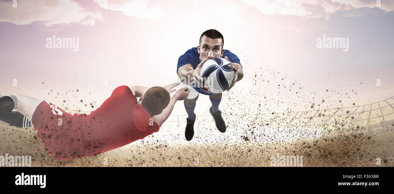 Composite image of a rugby player scoring a try Stock Photo - Alamy