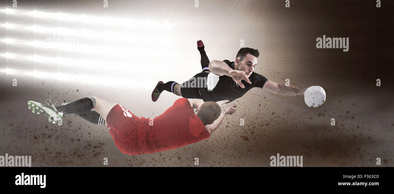Composite image of a rugby player scoring a try Stock Photo - Alamy
