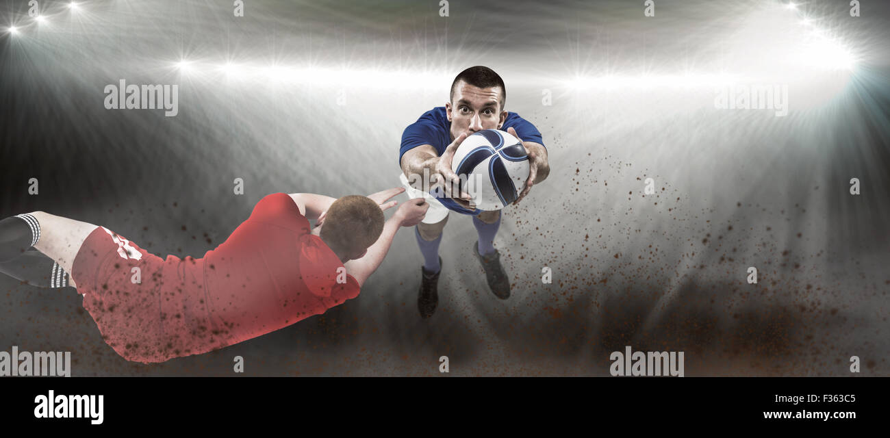 Composite image of a rugby player scoring a try Stock Photo - Alamy