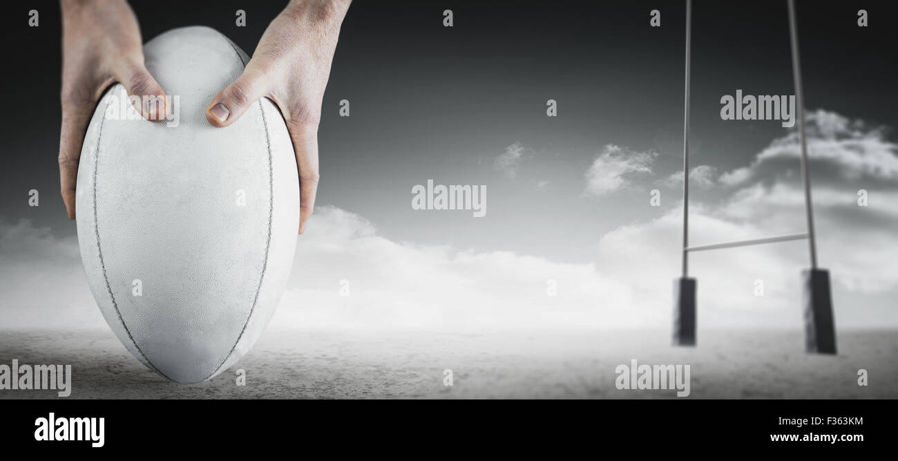 Composite image of rugby player catching a rugby ball Stock Photo - Alamy