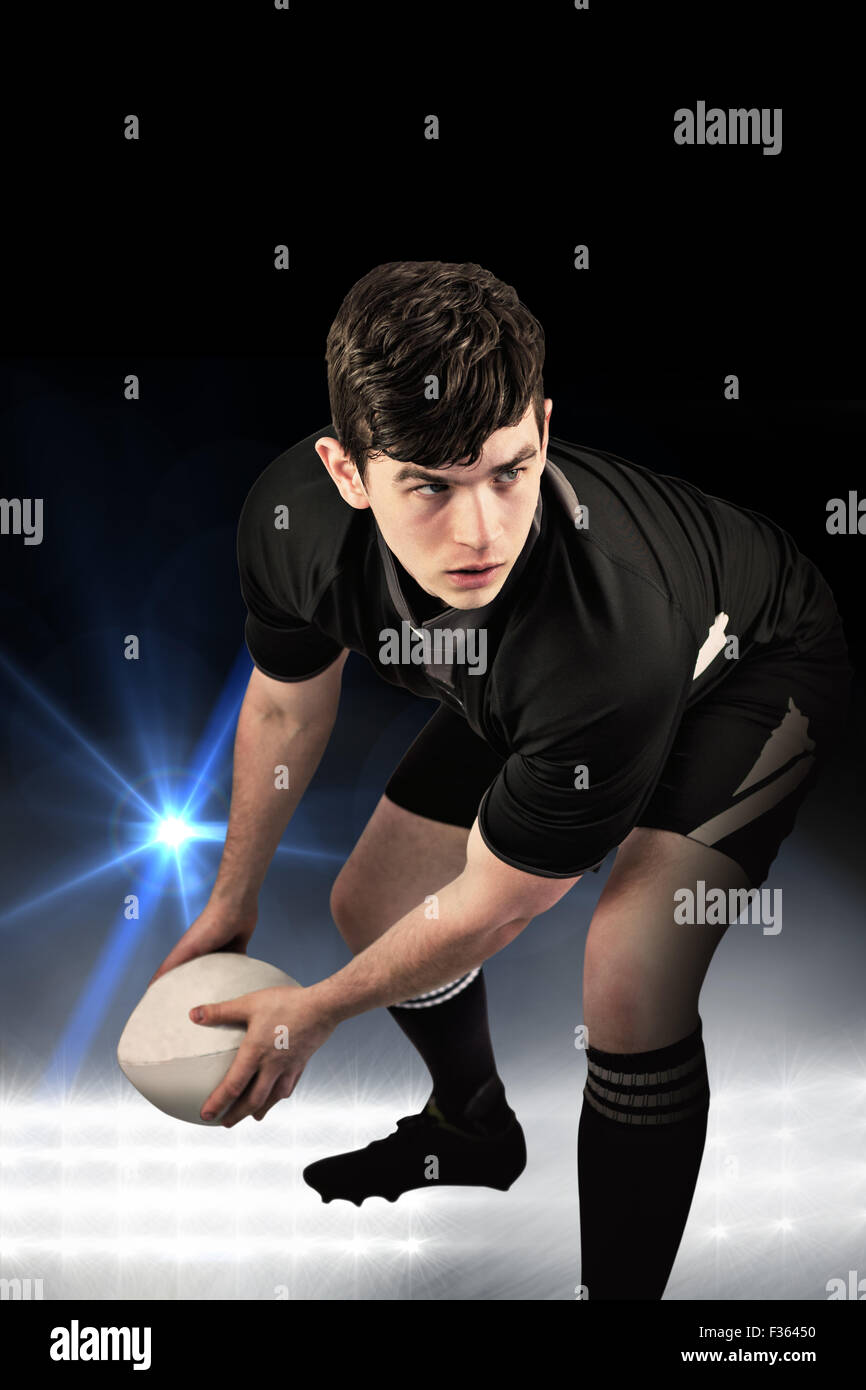 Composite image of rugby player about to throw the rugby ball Stock ...