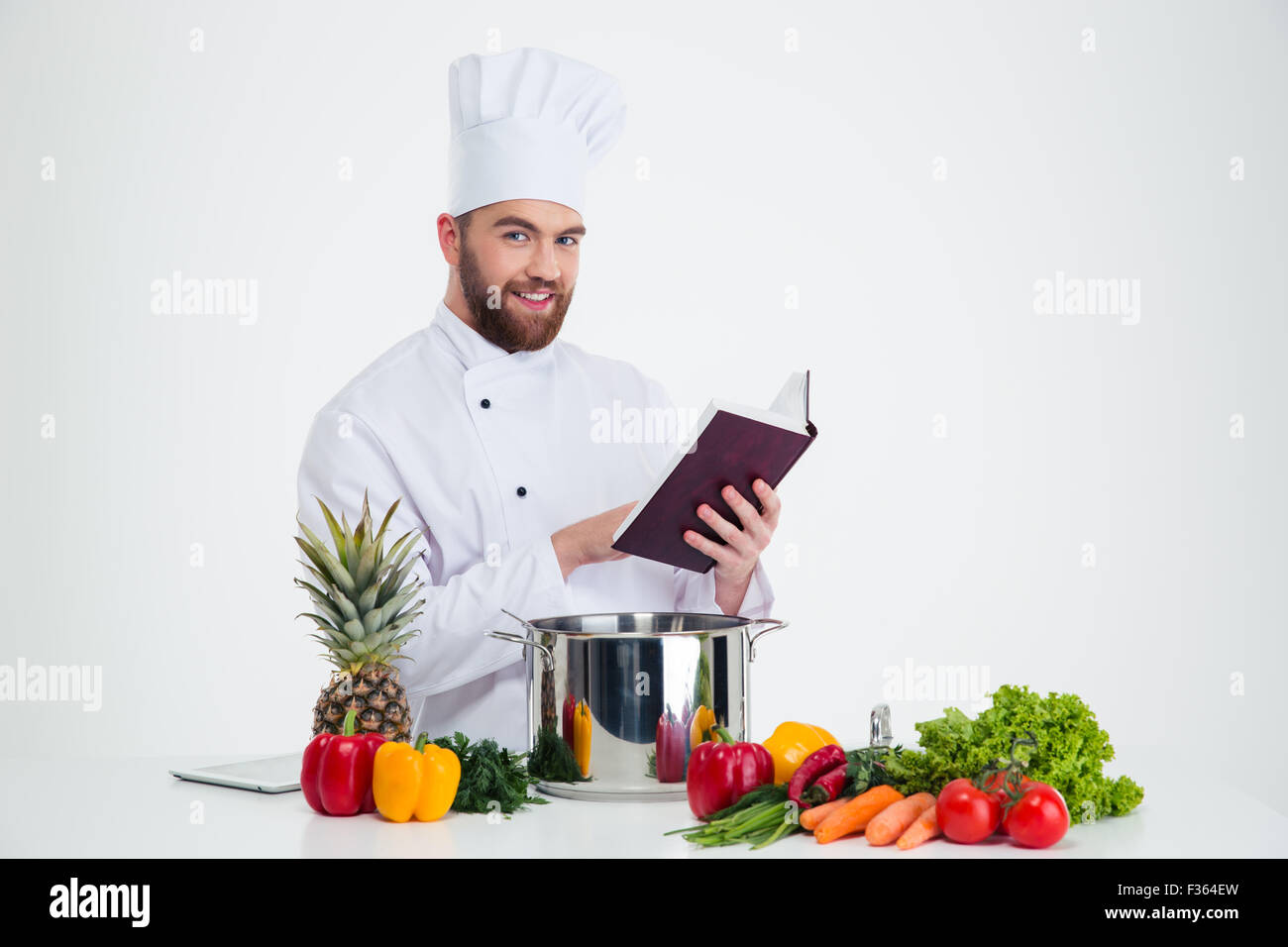 Chef holding his recipe book hi-res stock photography and images - Alamy