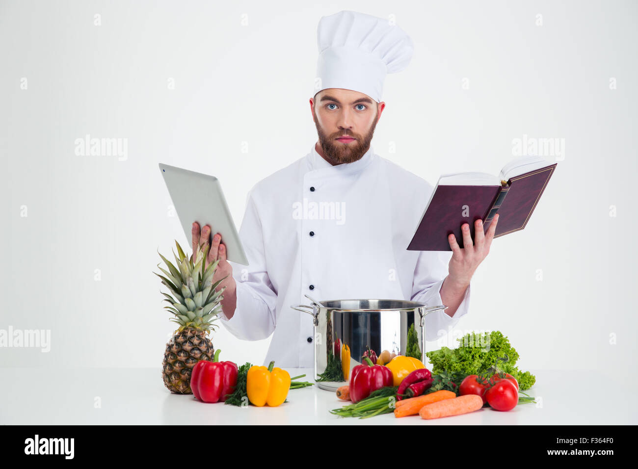 Chef holding his recipe book hi-res stock photography and images - Alamy