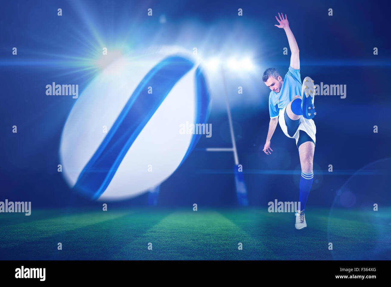 Composite image of rugby player kicking Stock Photo - Alamy