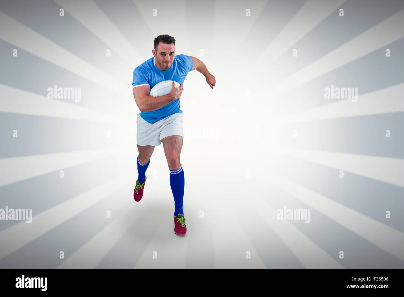 Composite image of rugby player running with the ball Stock Photo - Alamy