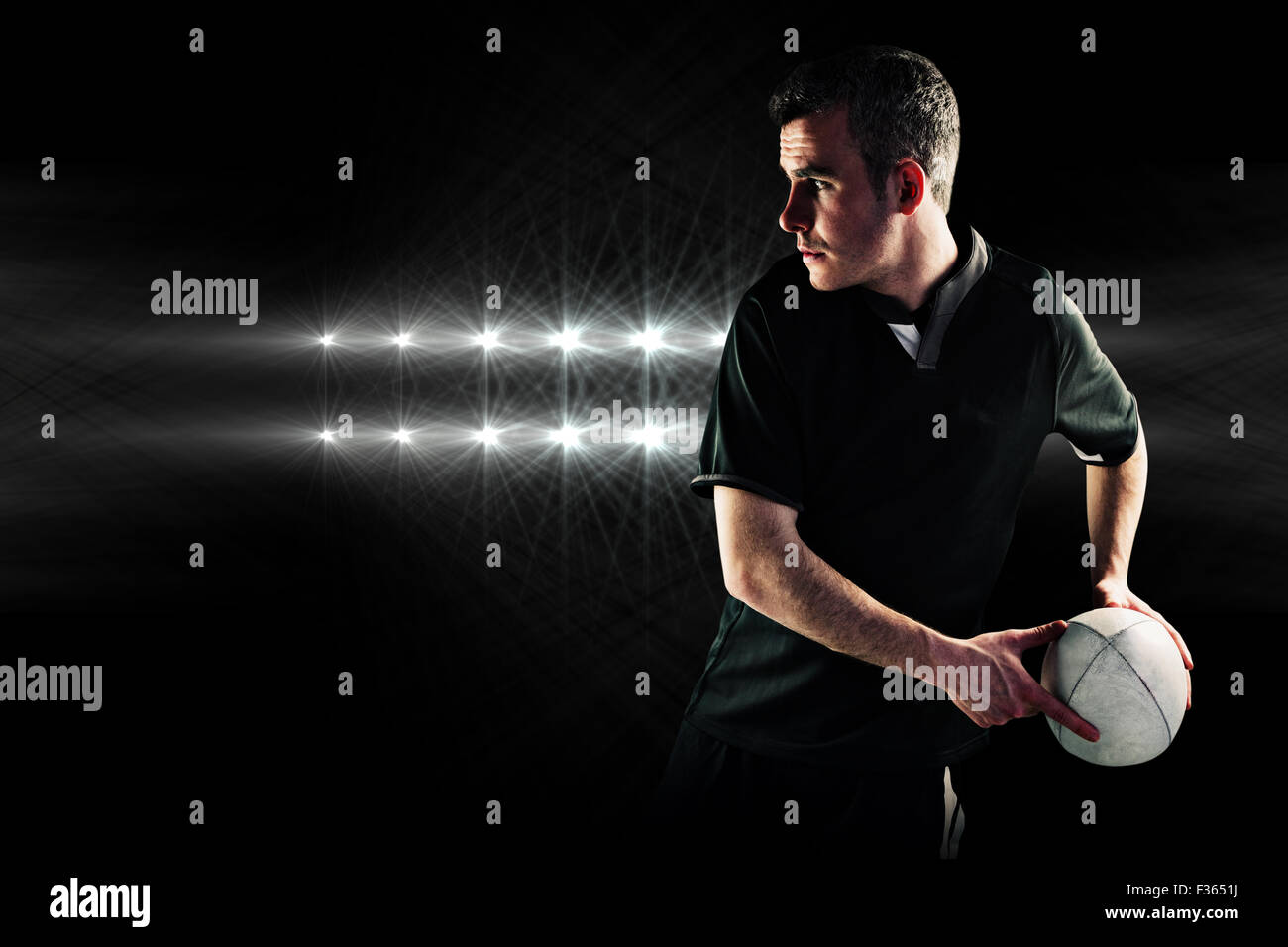 Composite image of rugby player doing a side pass Stock Photo - Alamy