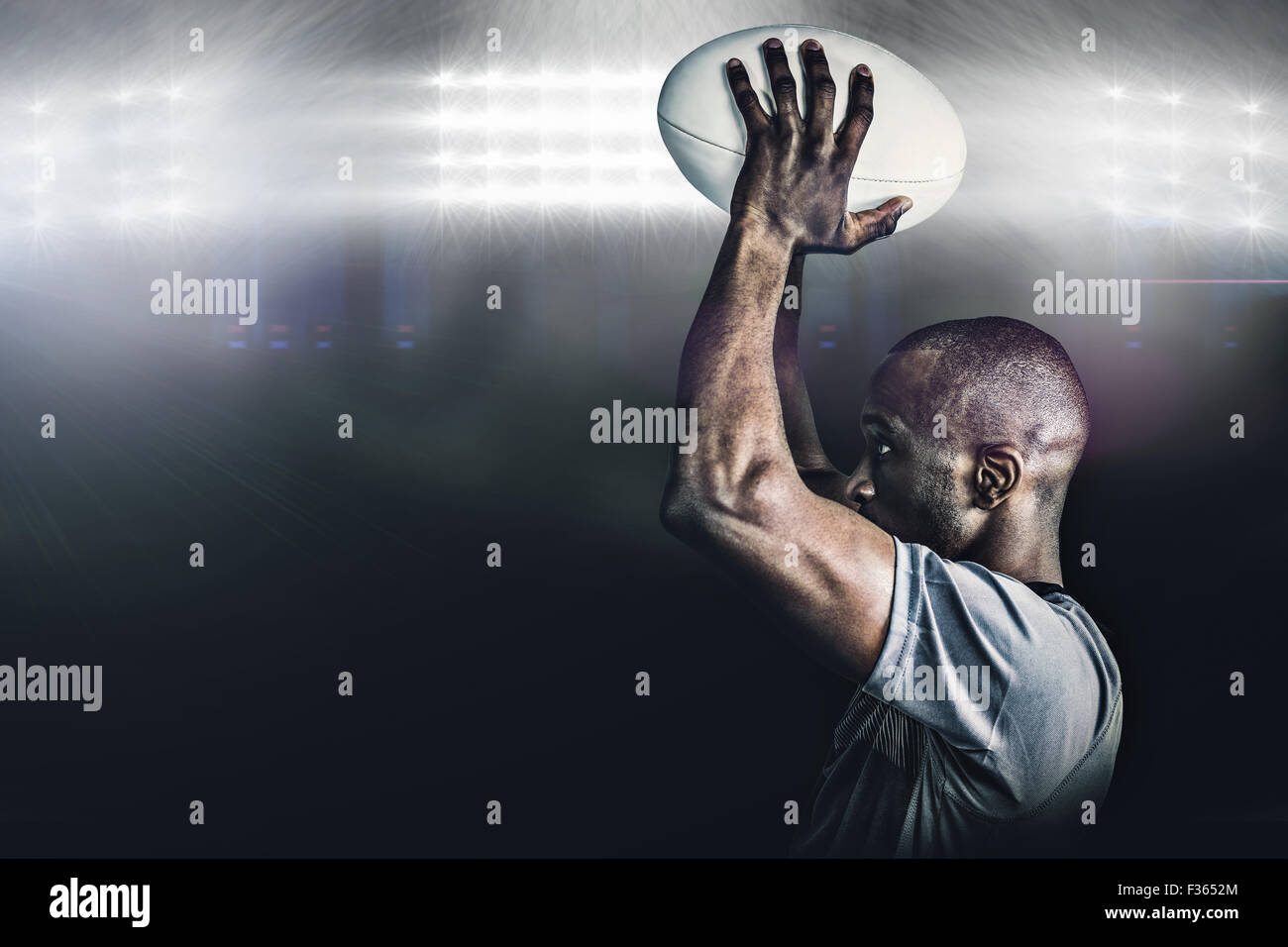 Composite image of rugby player throwing ball Stock Photo - Alamy