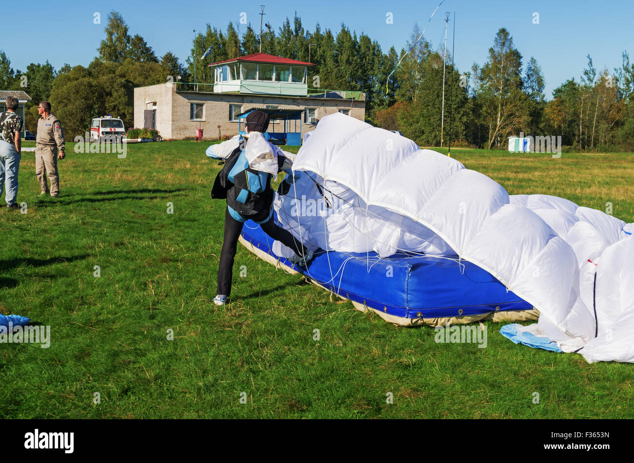 Parachutists - 2014. After landing Stock Photo - Alamy