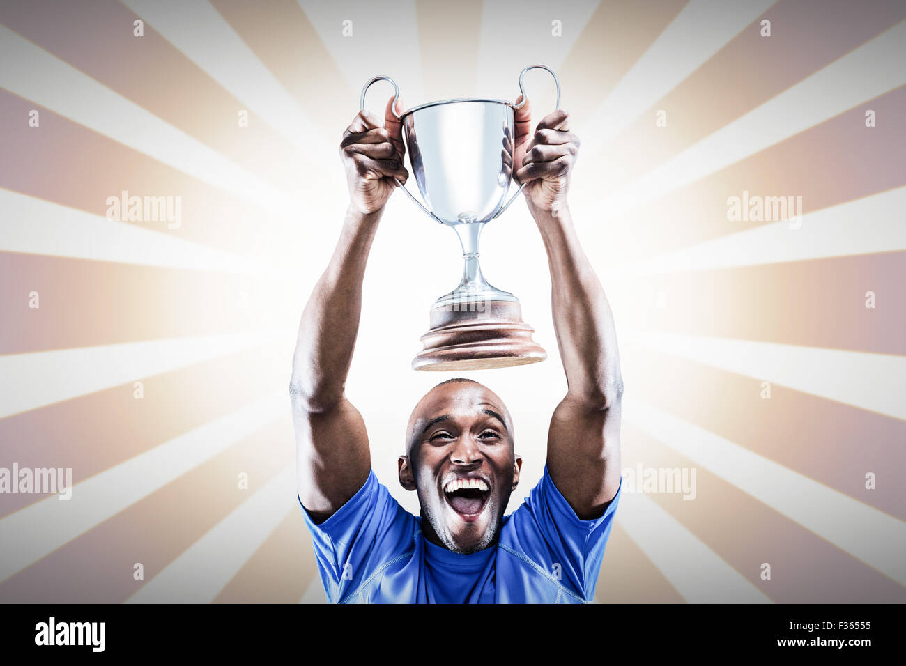 Composite image of cheering male with arms up Stock Photo - Alamy