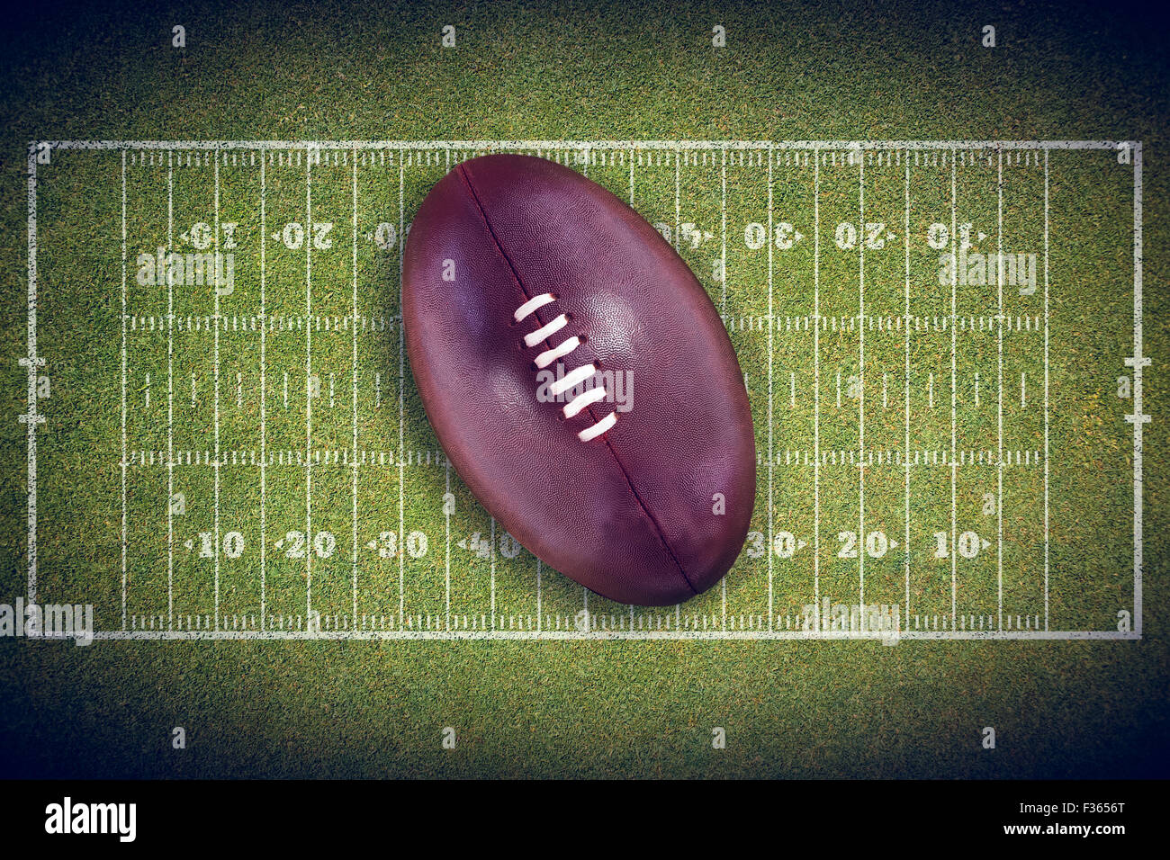 Composite image of american football Stock Photo - Alamy