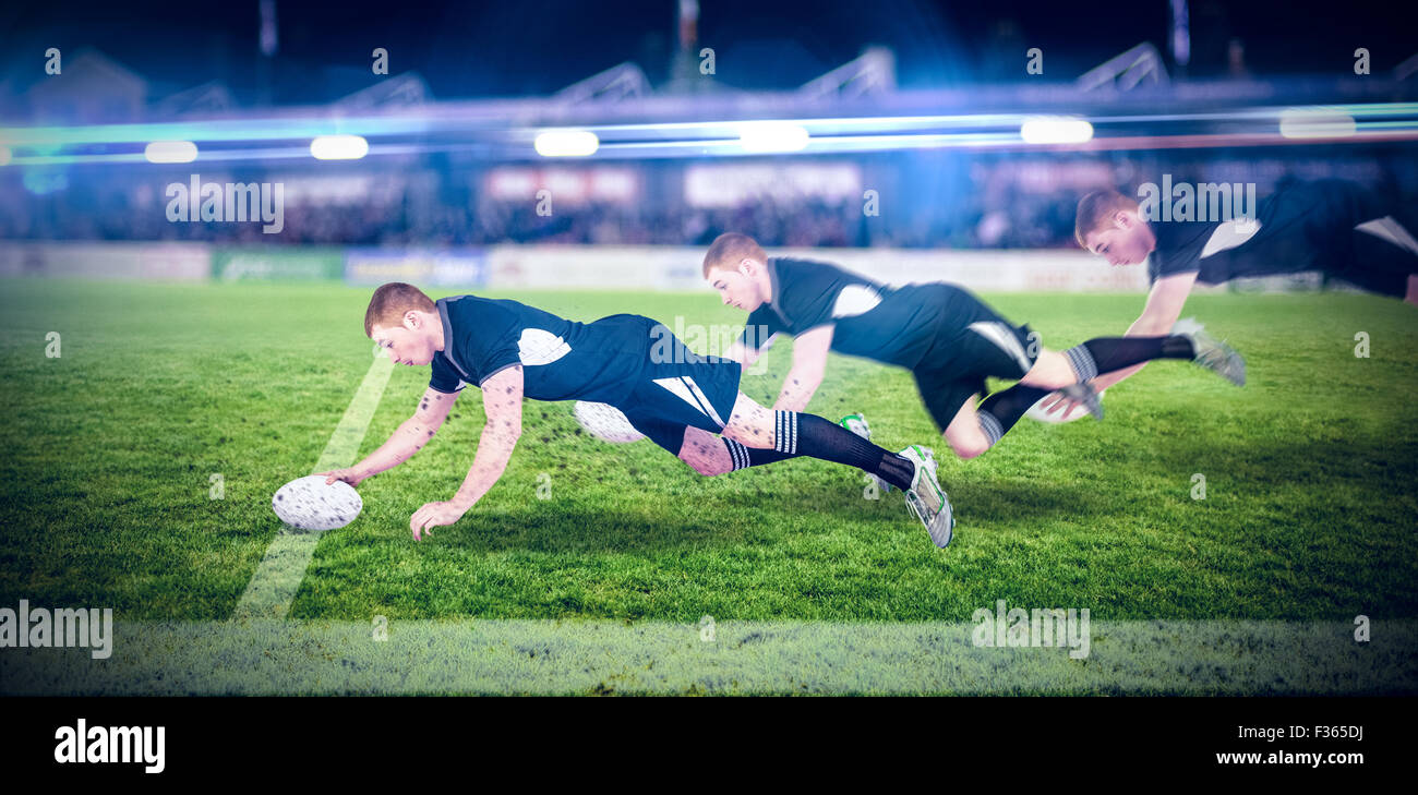 Composite image of a rugby player scoring a try Stock Photo - Alamy