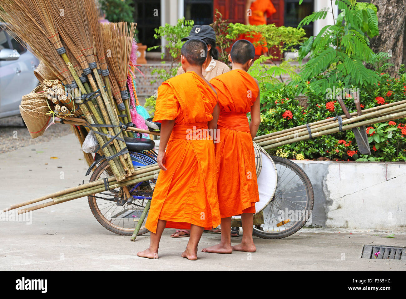 Buddhist Monks buying brushes, Vientiane, Laos Stock Photo - Alamy