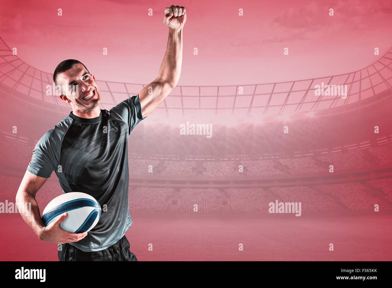 Composite image of happy rugby player punching the air Stock Photo - Alamy