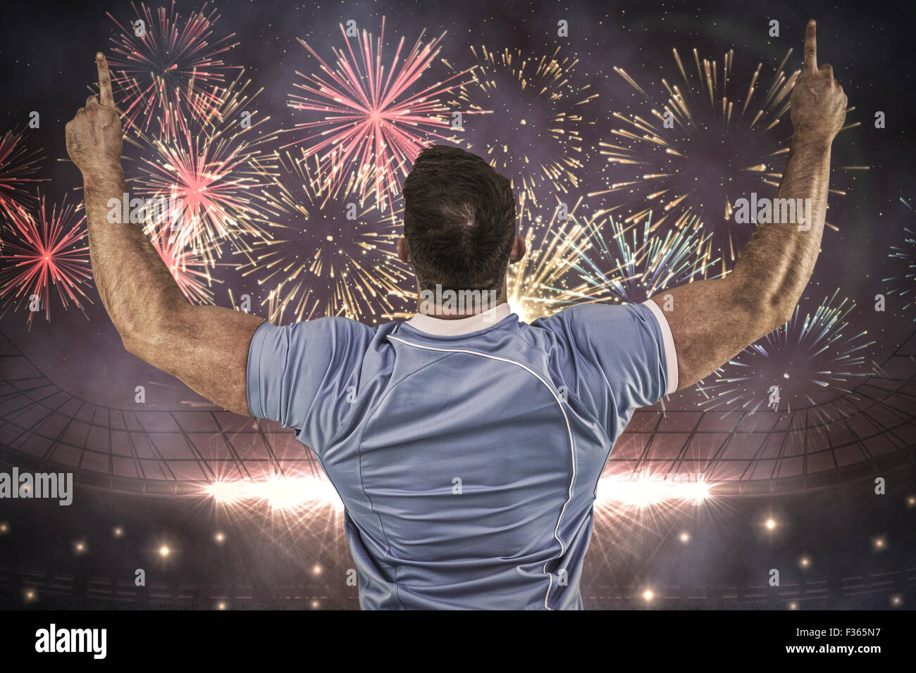 Composite image of rugby player cheering and pointing Stock Photo - Alamy