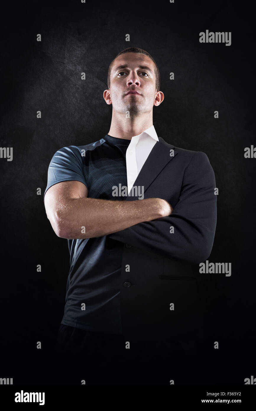 Composite image of confident rugby player with arms crossed Stock Photo ...