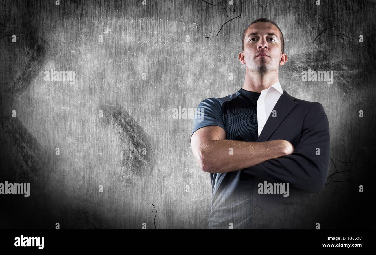 Composite image of confident rugby player with arms crossed Stock Photo ...