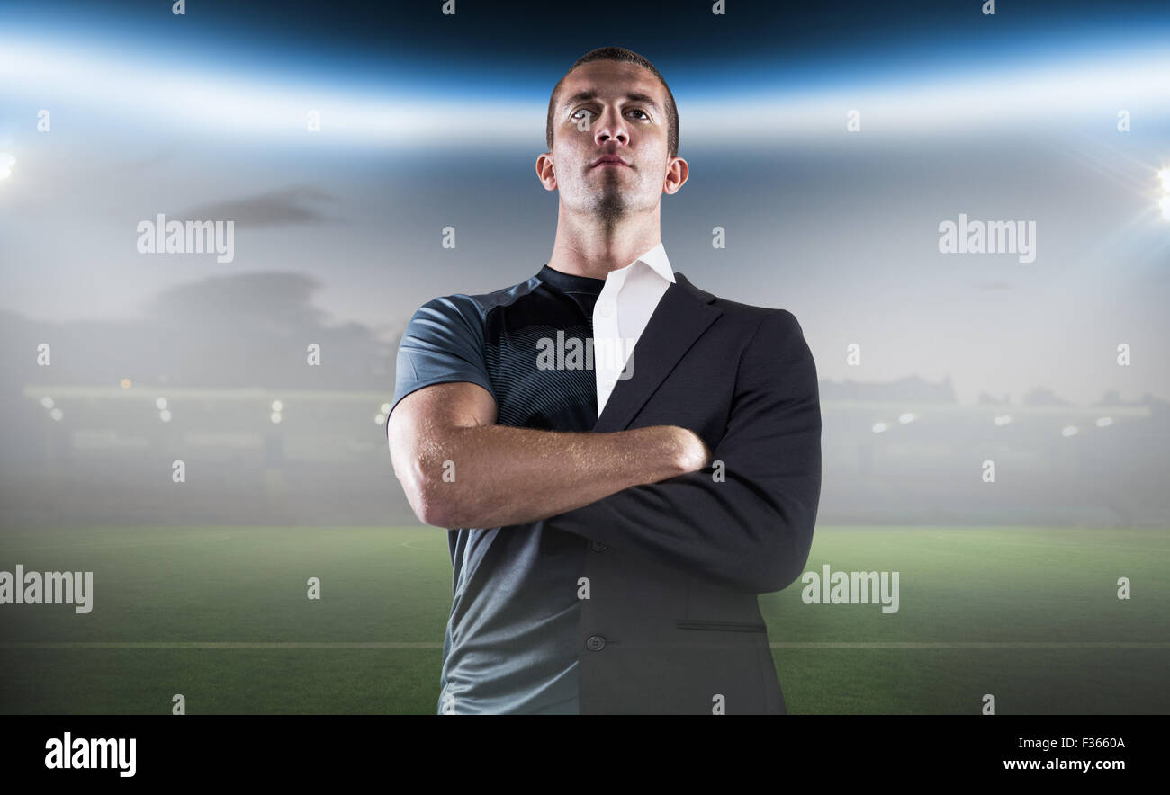 Composite image of confident rugby player with arms crossed Stock Photo ...