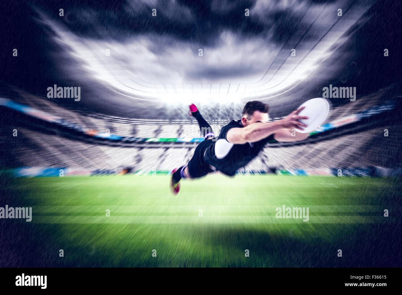 Composite image of rugby player scoring a try Stock Photo - Alamy