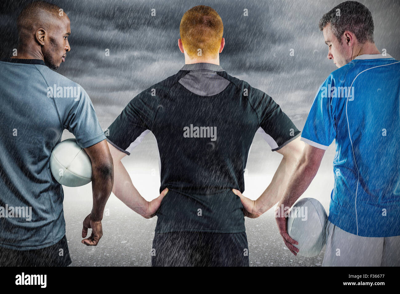 Composite image of tough rugby players Stock Photo - Alamy