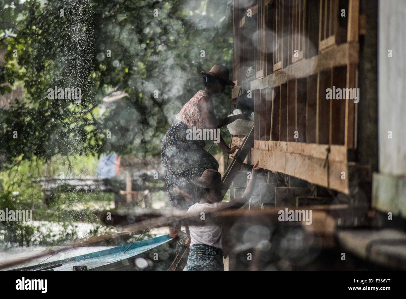 Rainstorm in a stilt village in the irrawaddy delta, Myanmar Stock ...