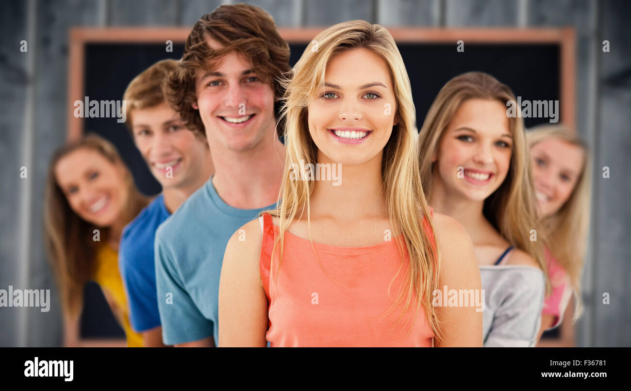 Composite image of group standing behind one another at varied angles ...