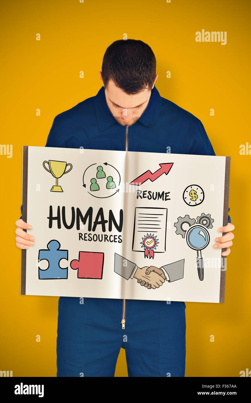 Worker reading manual hi-res stock photography and images - Alamy