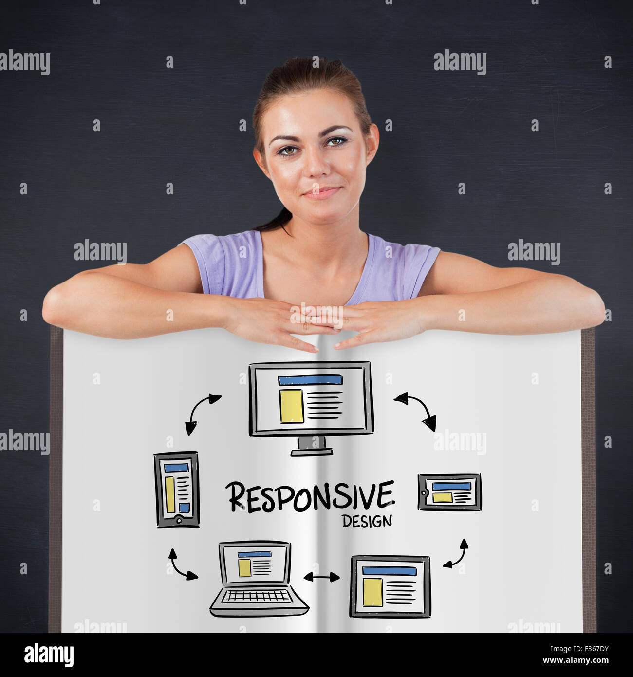 Composite image of pretty woman showing a book Stock Photo - Alamy