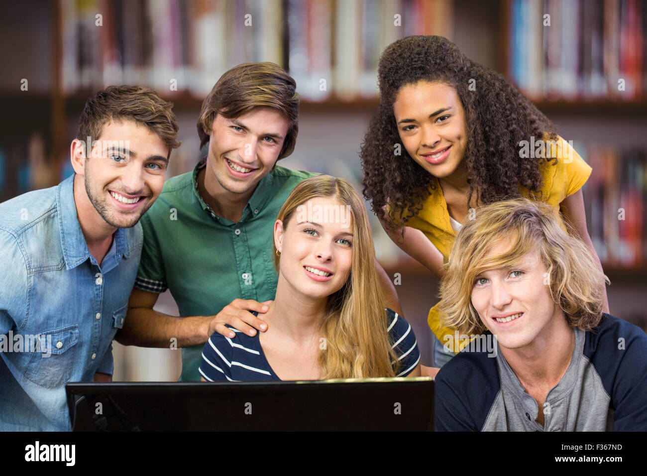 Composite image of college students using computer Stock Photo - Alamy