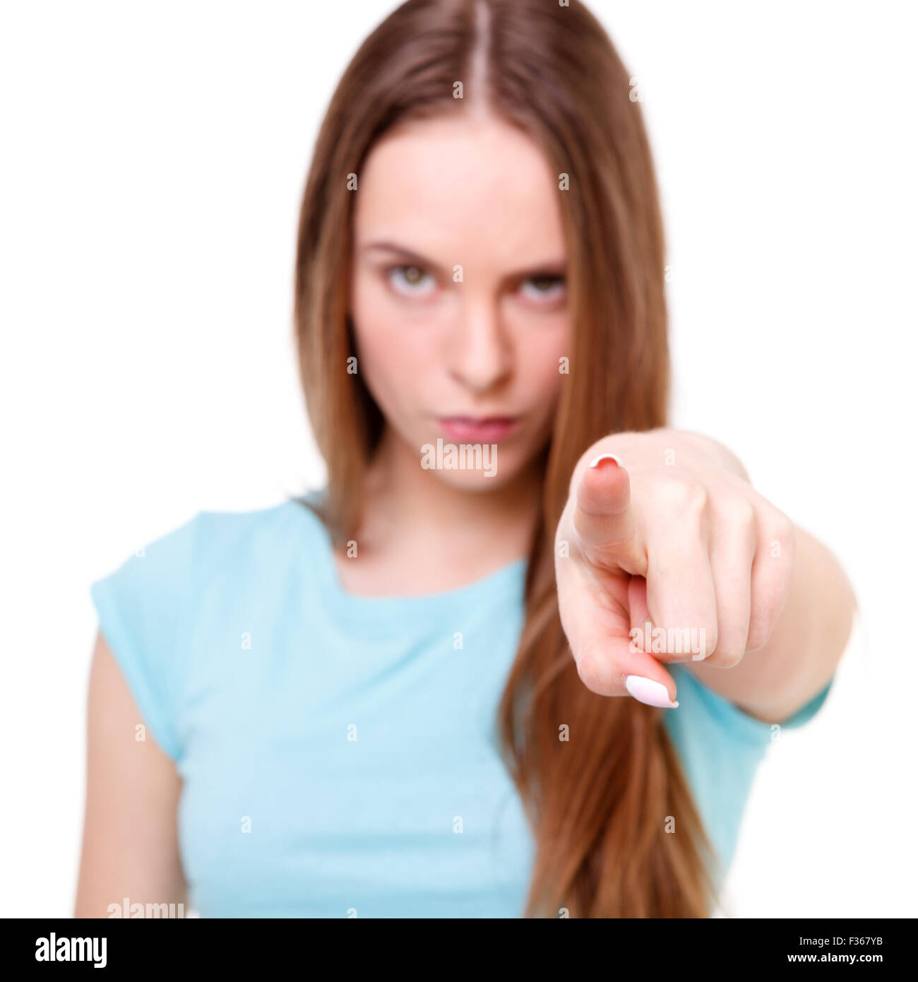 Young girl pointing at you - isolated on white background Stock Photo ...
