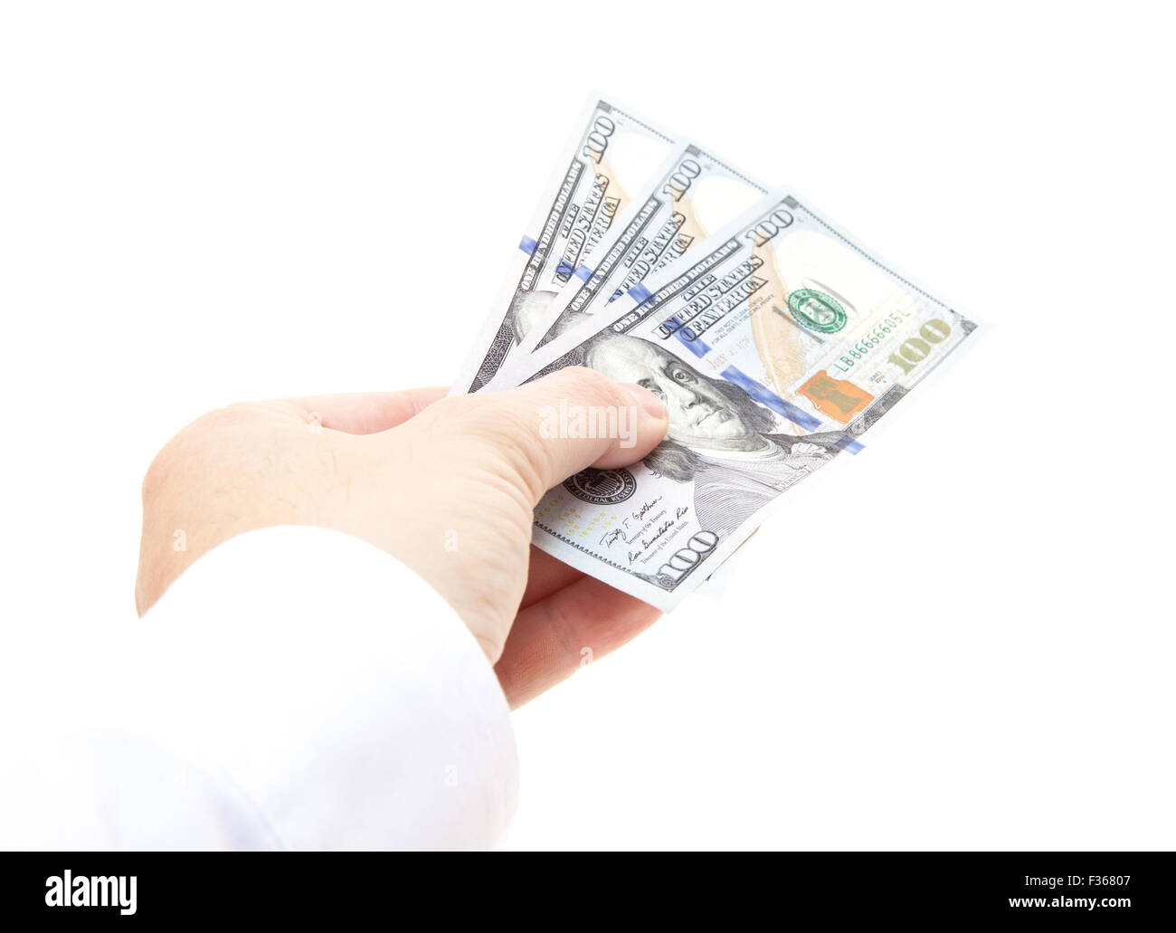 Handing money purchase Cut Out Stock Images & Pictures - Alamy