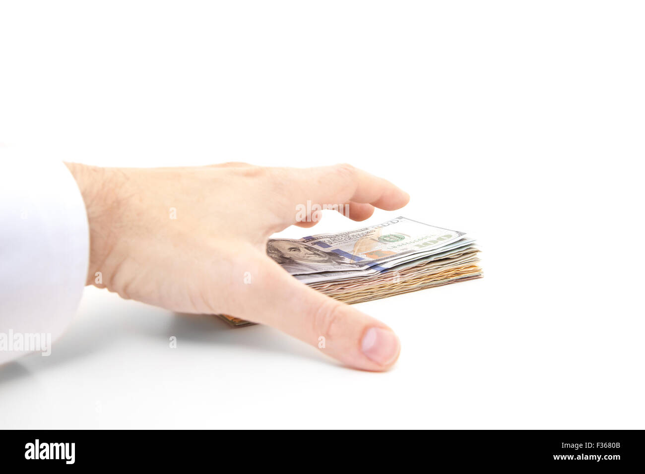 Hand grabbing money hi-res stock photography and images - Alamy