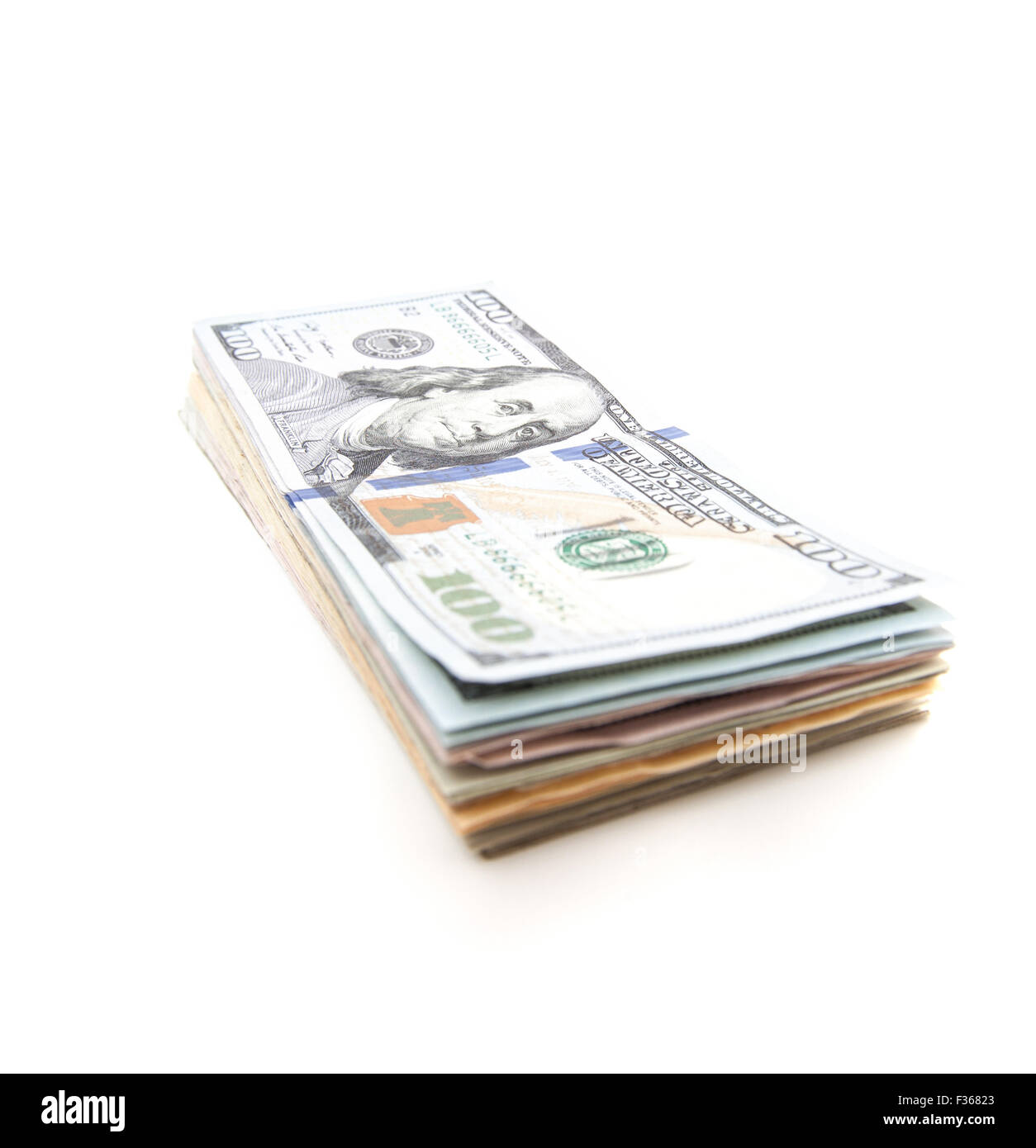 Pile of various dollar notes. All on white background Stock Photo - Alamy