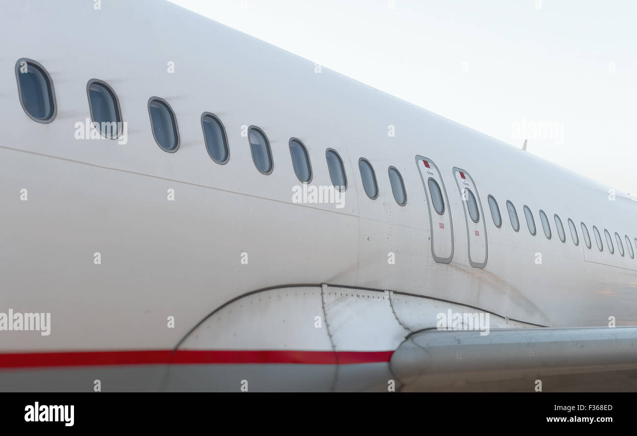 Passenger aircraft windows. View from outside Stock Photo - Alamy