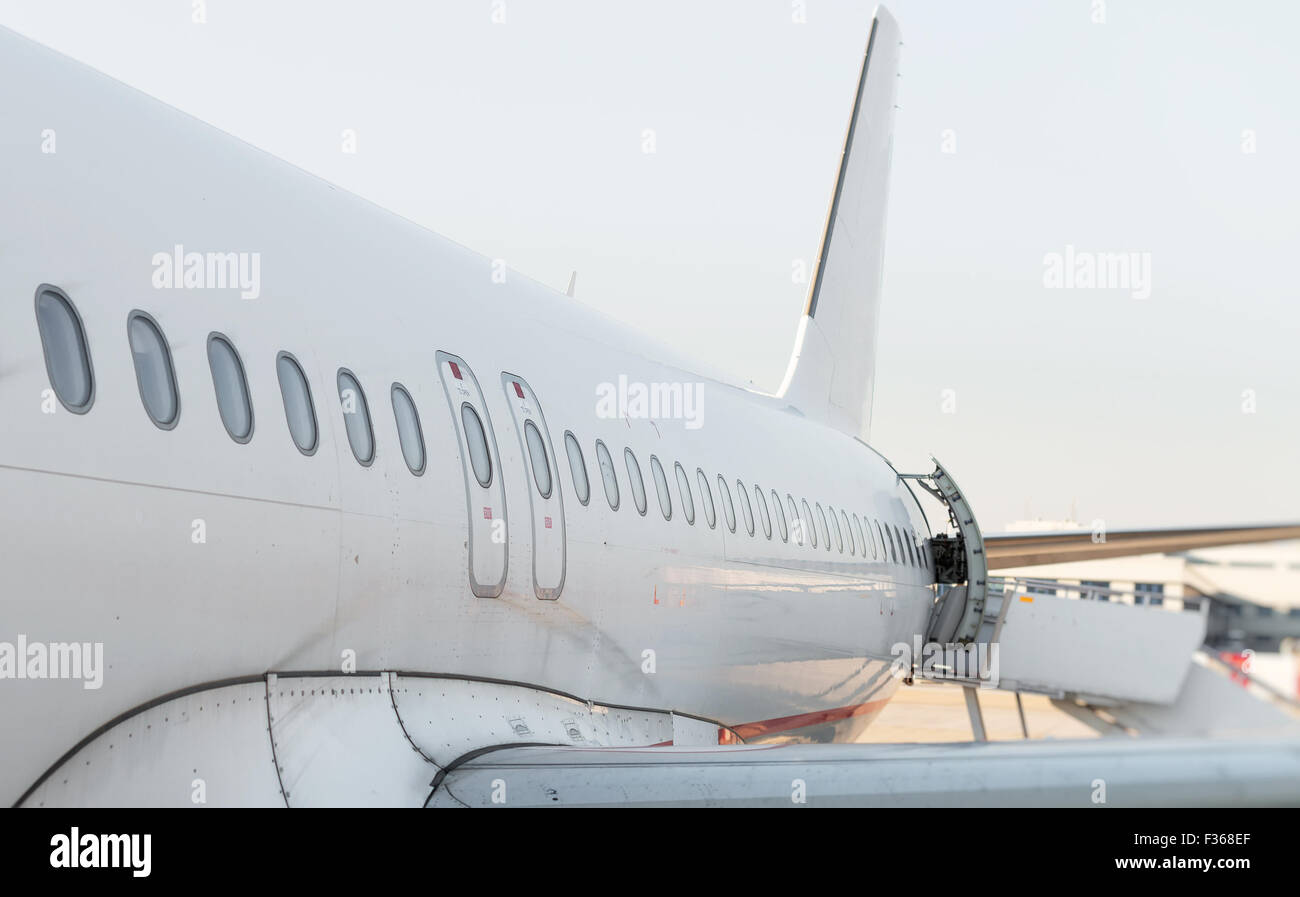 Passenger aircraft windows. View from outside Stock Photo - Alamy