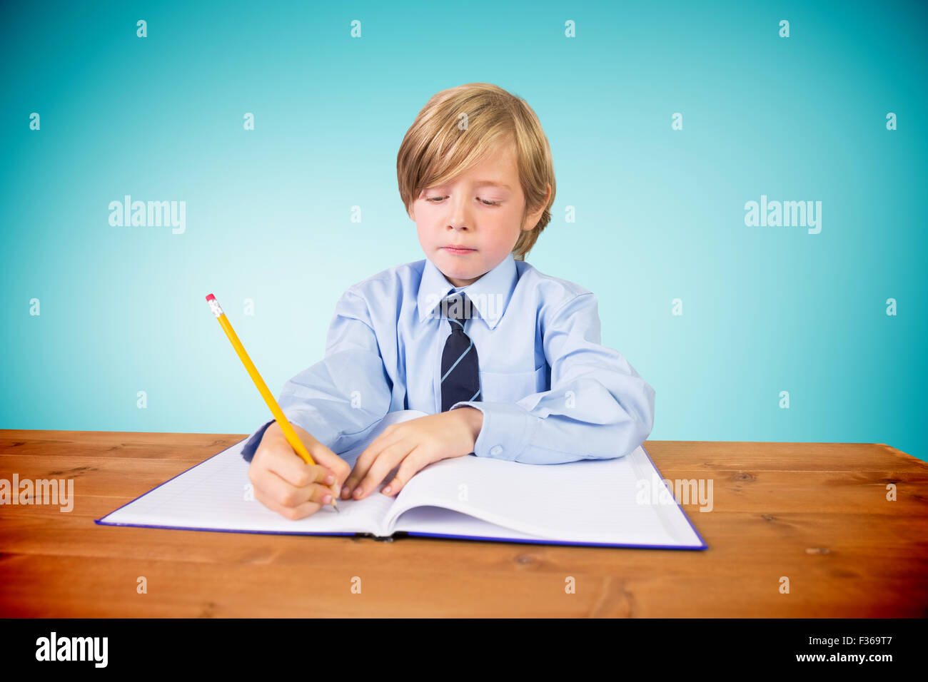 Boy sitting at computer writing hi-res stock photography and images - Alamy