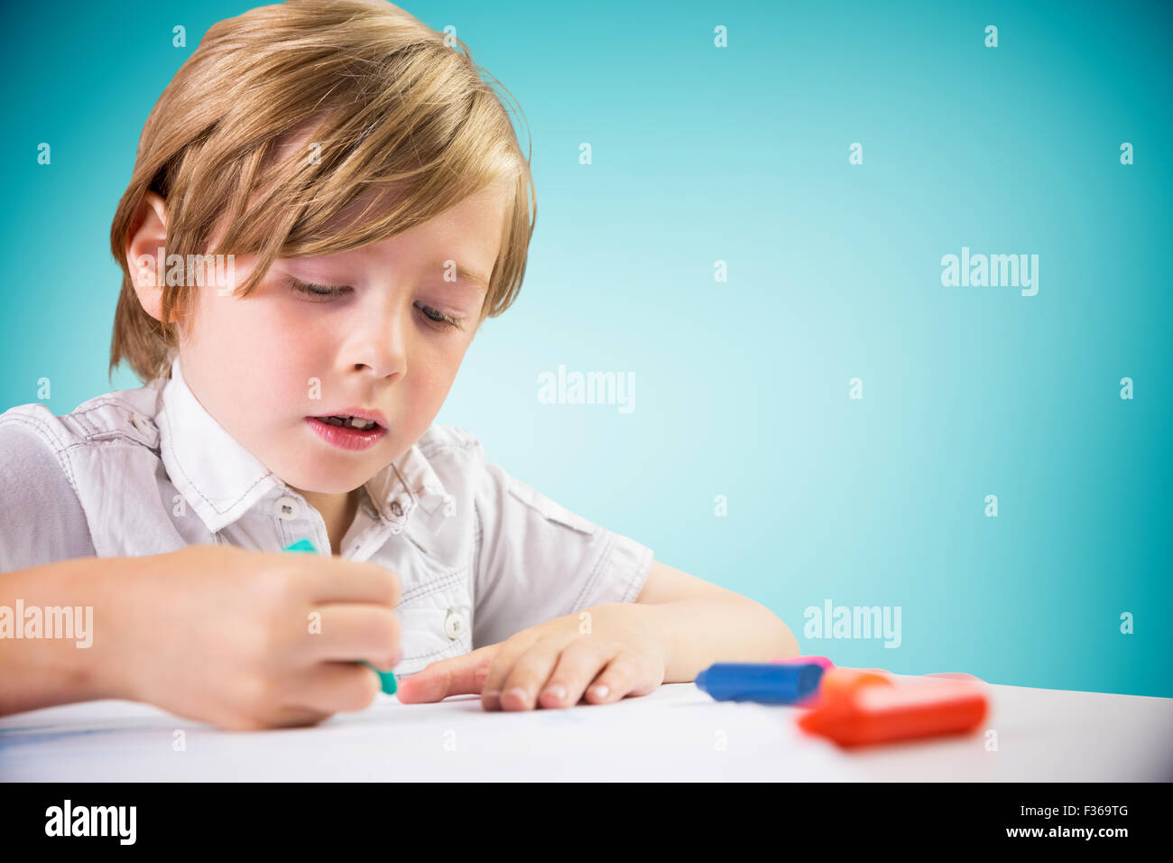 Composite image of cute boy colouring Stock Photo - Alamy