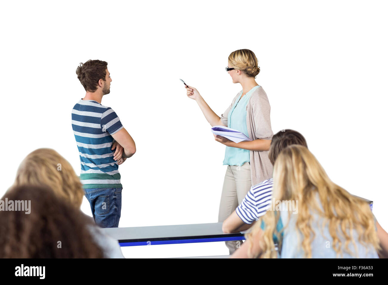 Composite image of student and teacher pointing at blackboard in class ...