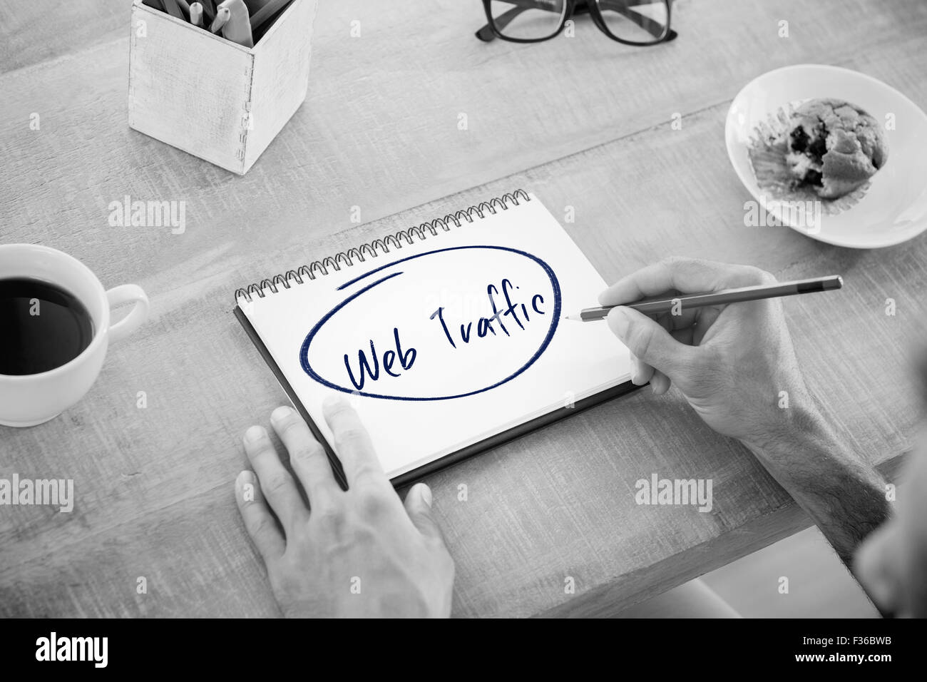 Testing against man writing notes on notebook Stock Photo - Alamy