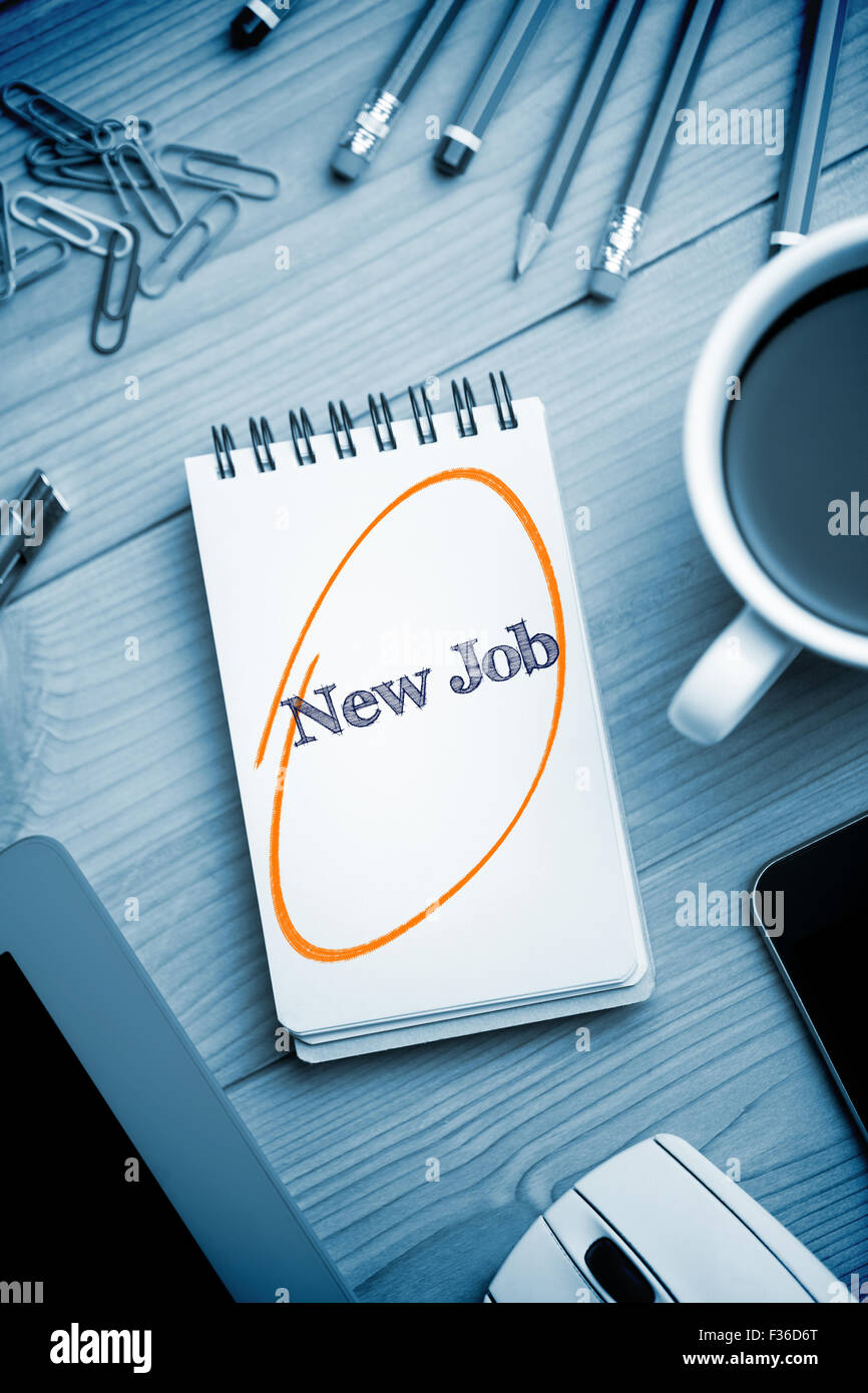 New job against notepad on desk Stock Photo - Alamy