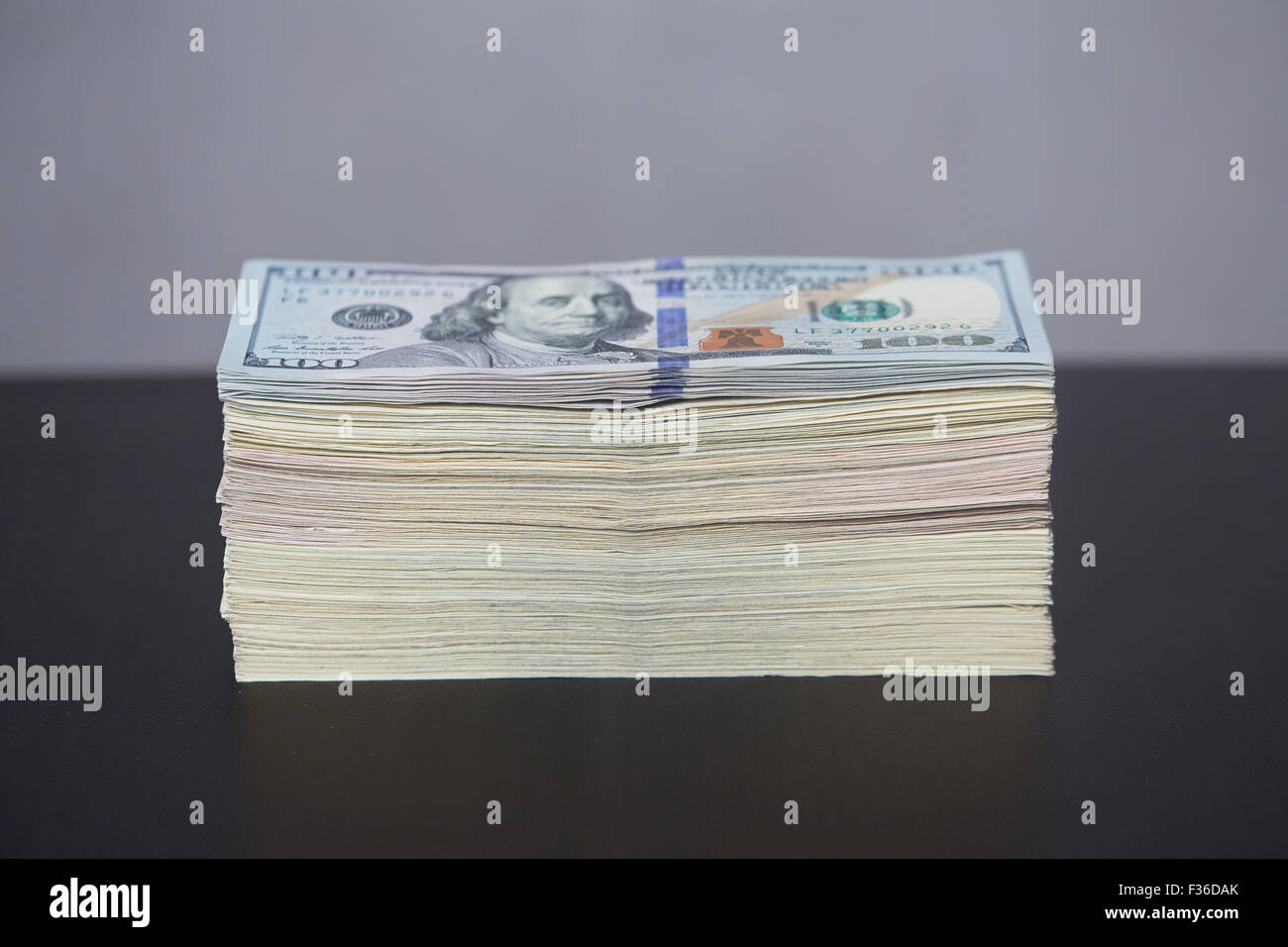 stacks of money Stock Photo - Alamy