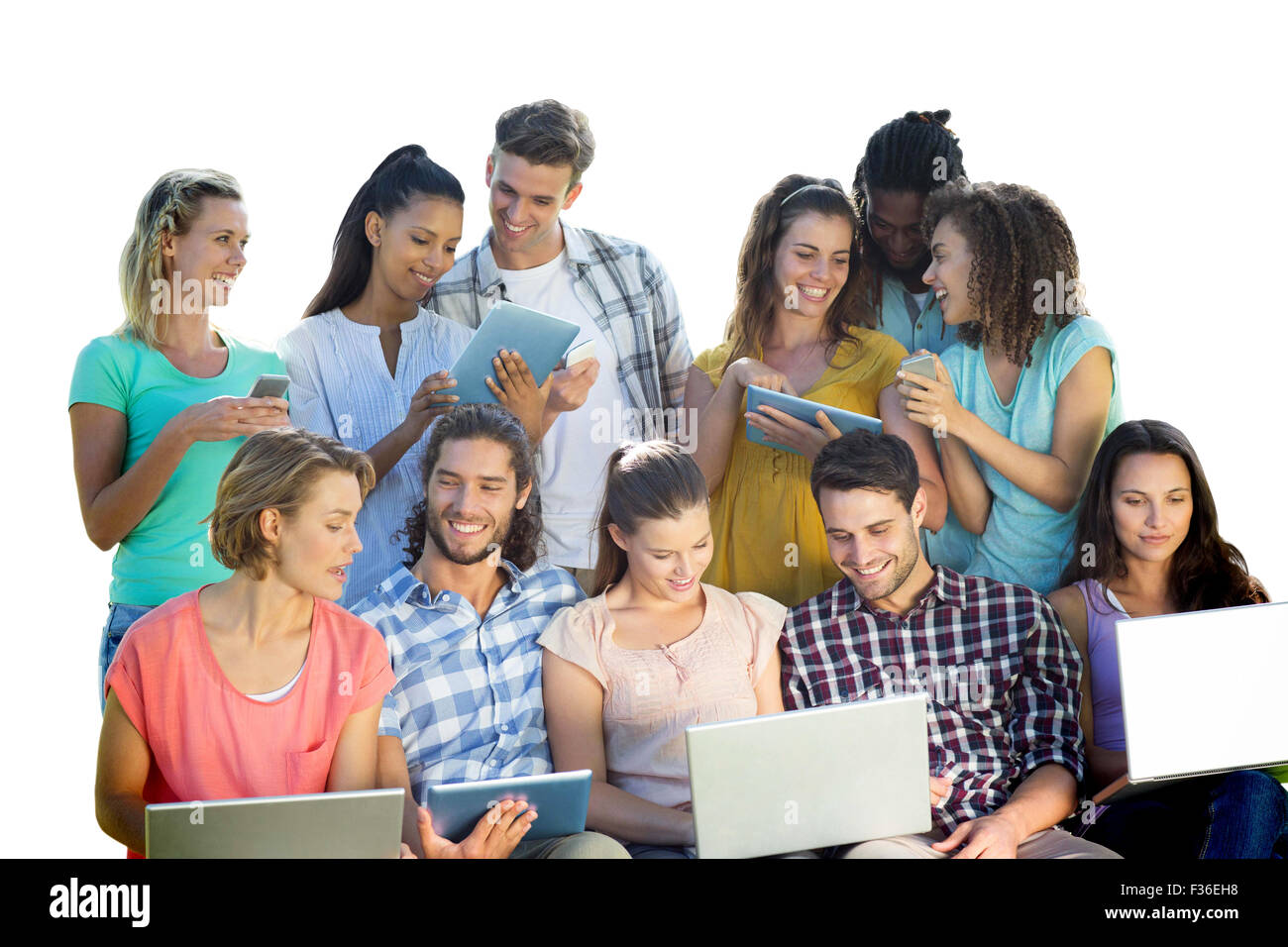 Composite image of several students using electronic devices Stock ...