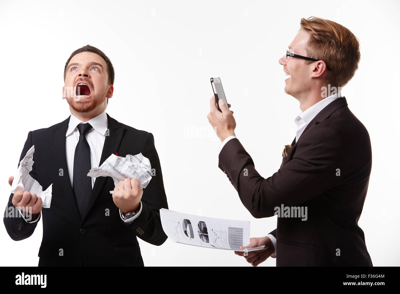 two businessmen discussing emotional, tears documents, photographs on ...