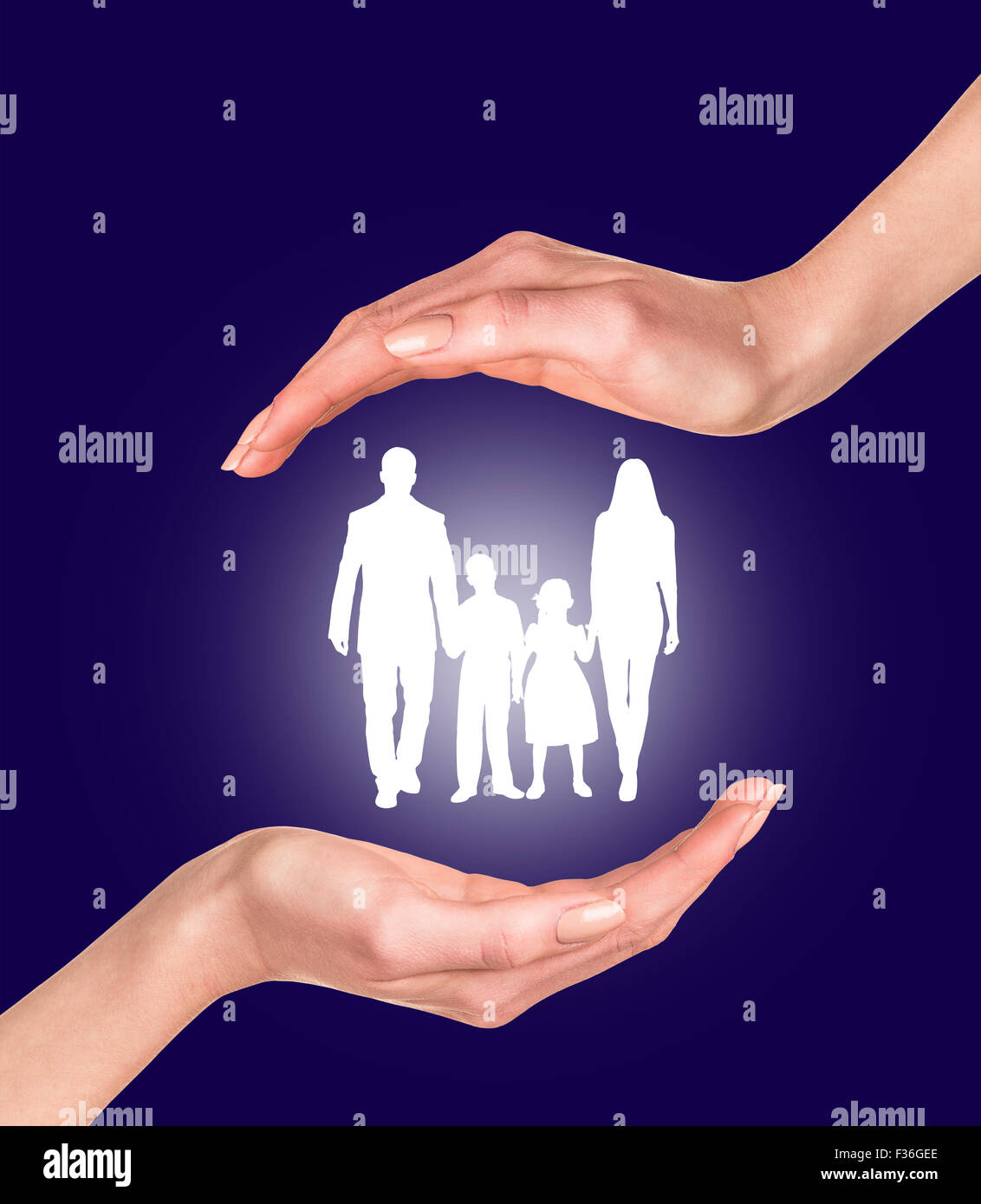 Family in hands Stock Photo - Alamy